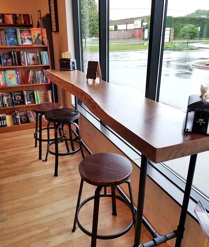 Window-side seating offers the perfect perch for watching the world go by while enjoying your meal and maybe cracking open a good book.