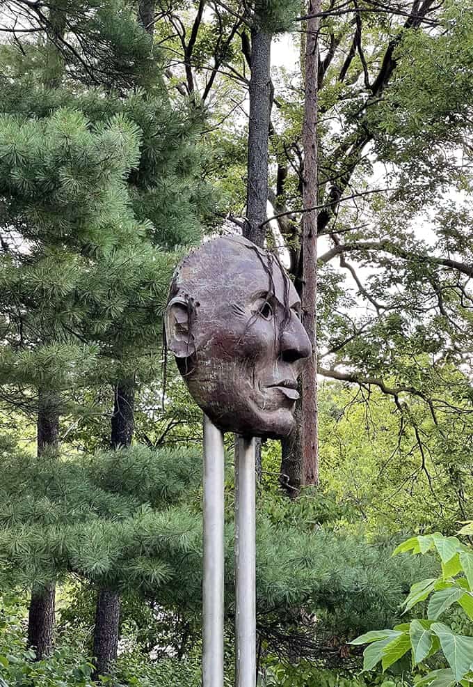 This striking portrait mask honors Little Crow, the Dakota leader, reminding visitors of the indigenous history that predates the city by thousands of years.
