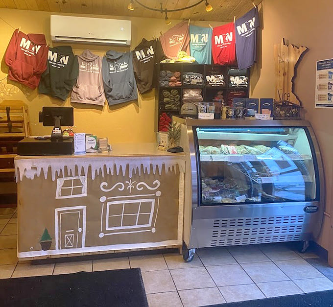 The counter area showcases local merchandise and treats, letting visitors take home edible souvenirs or t-shirts proclaiming their breakfast loyalty.