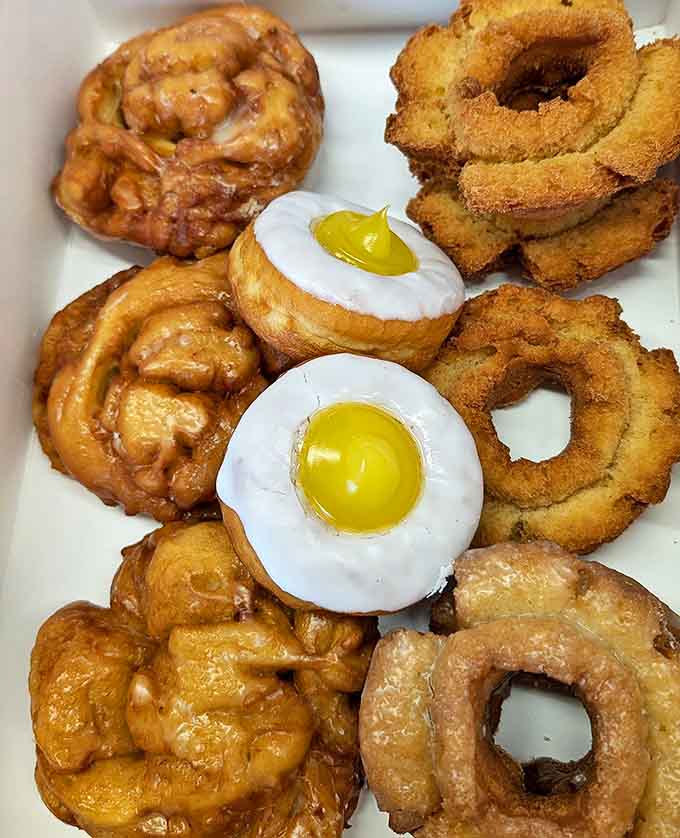 A box of greatest hits &ndash; apple fritters, sunny-side-up donuts, and old-fashioned cake rings that demand to be dunked in coffee.