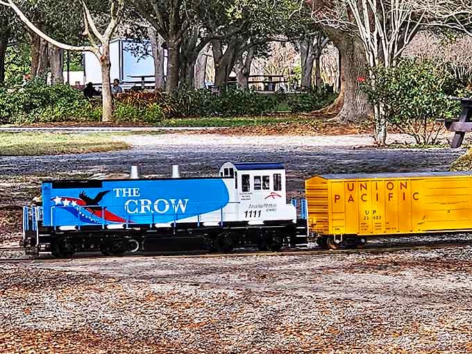 The Crow locomotive pulls its bright yellow Union Pacific car along the track &ndash; each train telling its own story through meticulous design and authentic details.