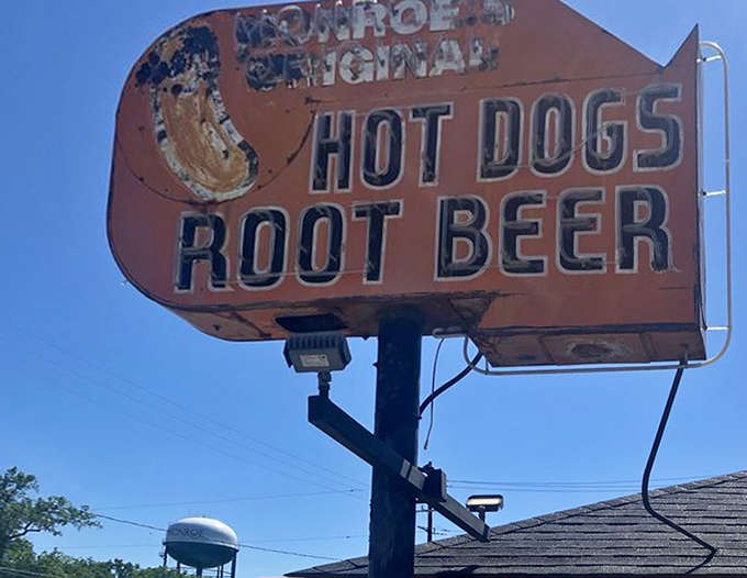 Monroe's iconic sign has weathered decades of Michigan seasons, standing as a beacon for hungry travelers seeking authentic American comfort food.