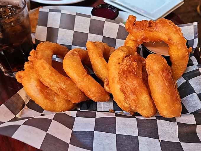 Onion rings so golden and crispy they could win beauty pageants in the vegetable world.