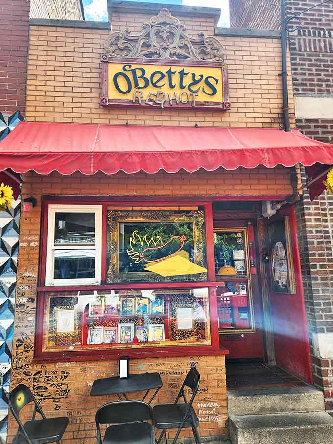 By day, the modest brick storefront with its geometric-patterned wall hints at the creative spirit waiting inside this Athens culinary landmark.