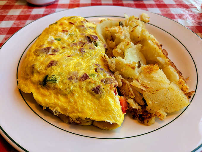 An omelet that's basically an egg hug around perfectly saut&eacute;ed fillings &ndash; comfort food in its purest form.