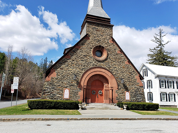 Our Lady of the Snows Church: Stone and stained glass create a sanctuary that's both architecturally stunning and spiritually peaceful against Vermont's autumn landscape.