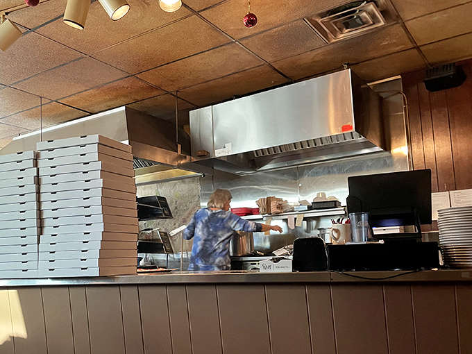 The heart of operations: Pagliai's open kitchen design lets diners witness the pizza-making process from dough tossing to final bake.