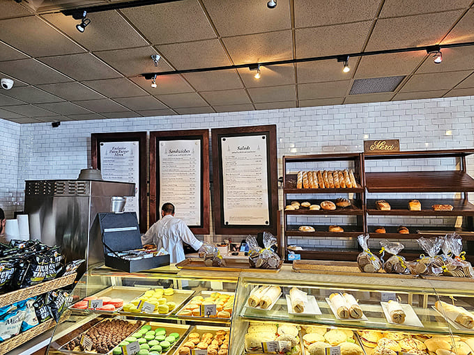 Behind-the-scenes glimpse of where the magic happens, with fresh bread lined up like delicious soldiers awaiting deployment to hungry customers.