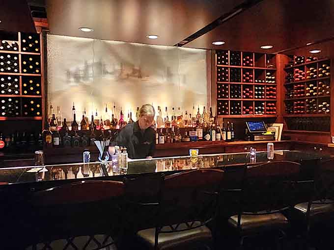 The well-stocked bar gleams with promise, offering liquid accompaniments that elevate your meal from merely good to genuinely memorable and worth repeating.