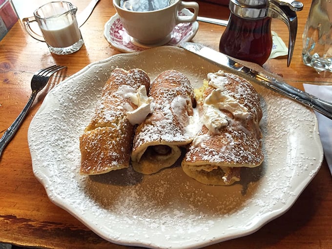 These aren't ordinary pancake rolls &ndash; they're pillowy perfection dusted with powdered sugar and stuffed with morning happiness.