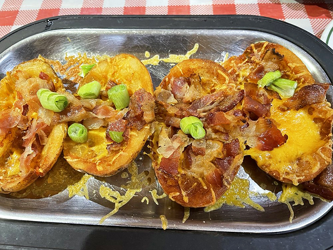 Twice-cooked potatoes loaded with cheese, bacon, and green onions&mdash;proof that sometimes the simplest pleasures are the most satisfying.