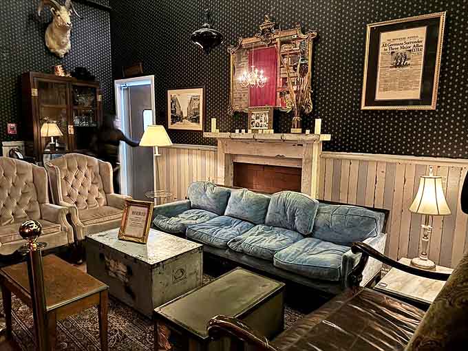 Vintage furnishings, period-appropriate lighting, and carefully curated d&eacute;cor transform this intimate corner into a private sanctuary for special occasions.