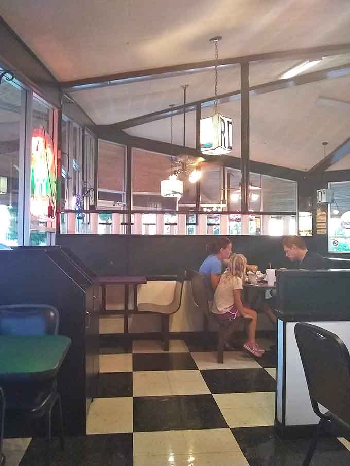 Families gather in cozy booths where generations have shared meals, creating that warm community atmosphere that makes R D's feel like home.