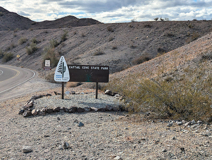 Welcome to paradise! This unassuming entrance sign marks the boundary between ordinary and extraordinary.