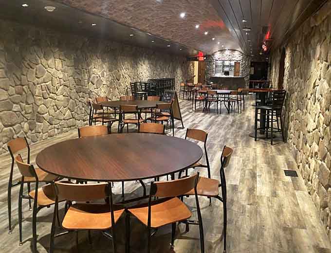 The dining room stretches back with plenty of seating, stone walls providing character while you provide the appetite for great food.