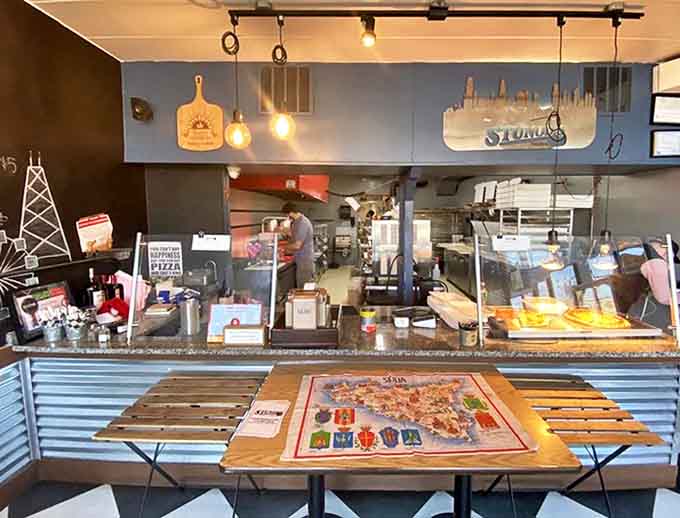 Where the magic happens &ndash; the counter view into Stunod's kitchen reveals the choreographed dance of pizza-making professionals.