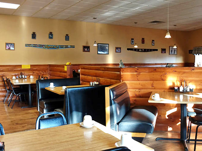 Wooden booth dividers and simple d&eacute;cor create an unpretentious backdrop where the food and company take center stage.