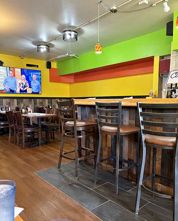 Comfortable seating and bright colors make this dining area feel energizing without being overwhelming or loud.