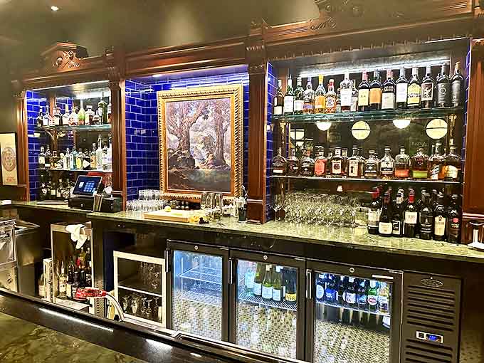 The bar showcases an impressive spirits collection, where classic cocktails are crafted with the same precision as the kitchen's finest dishes.