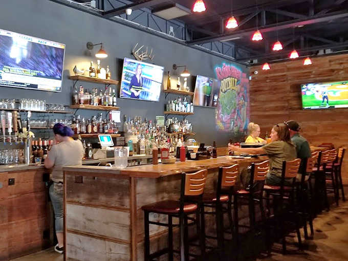 Bourbon heaven meets barbecue paradise at this handsome wooden bar where craft cocktails complement smoky flavors perfectly.