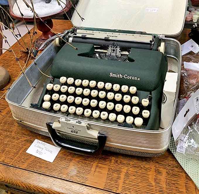 This Smith-Corona typewriter sits ready for its next great American novel, keys worn smooth by the fingertips of countless untold stories.