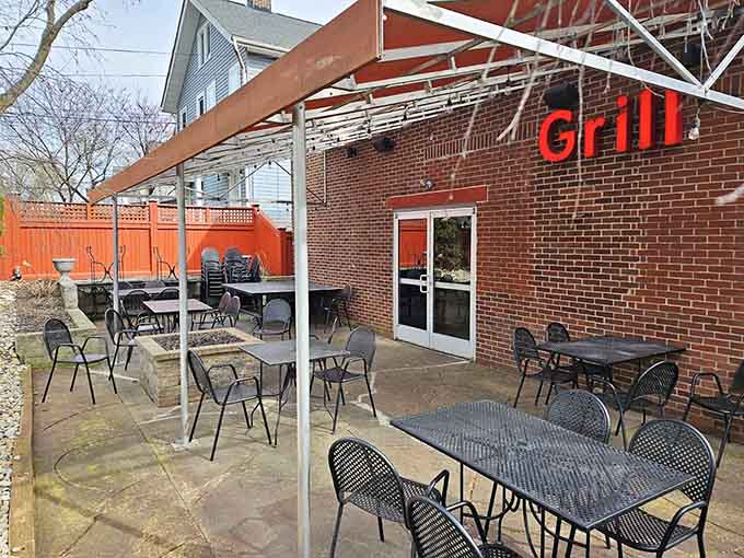 The covered patio offers the perfect escape for outdoor dining, where string lights and good food make everything feel right.