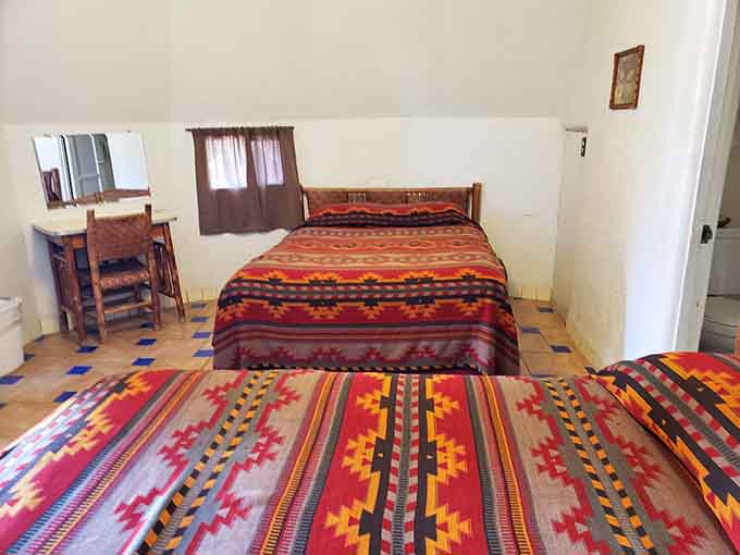 Simple but comfortable sleeping quarters prove you don't need luxury amenities when you're staying in a concrete teepee full of character and history.