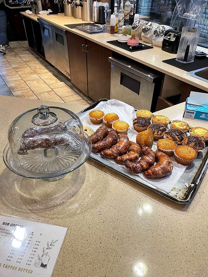 The pastry display &ndash; a glass case of delicious dilemmas where decision-making becomes the sweetest form of morning torture.