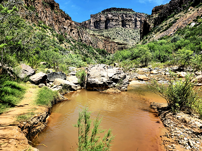 Ghost town relic: This weathered wooden structure stands as a silent witness to Arizona's frontier past, slowly returning to the desert from which it came.