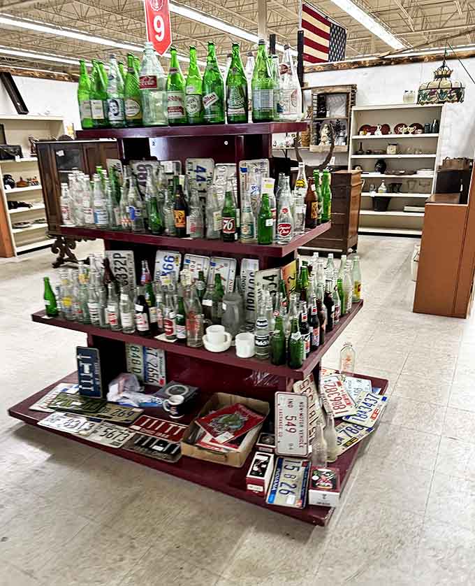 Vintage bottles and license plates create a colorful display of Americana. Each bottle probably emptied at celebrations long forgotten.