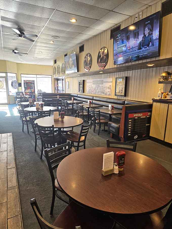 The dining area strikes that perfect balance between sports bar energy and family restaurant comfort. Everyone feels welcome here.