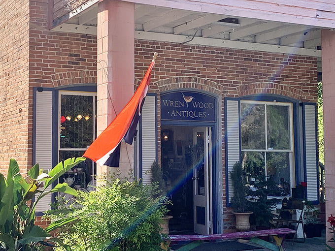 Wren Wood Antiques beckons treasure hunters with its colorful flag and promise of discoveries that won't involve scrolling or swiping.