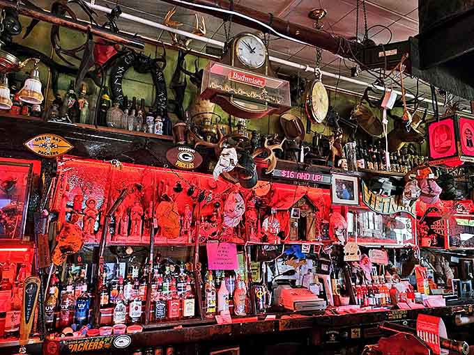 Behind the bar, bottles stand in neat formation &ndash; a surprising display of order amidst the beautiful chaos that reigns throughout the rest of the space.