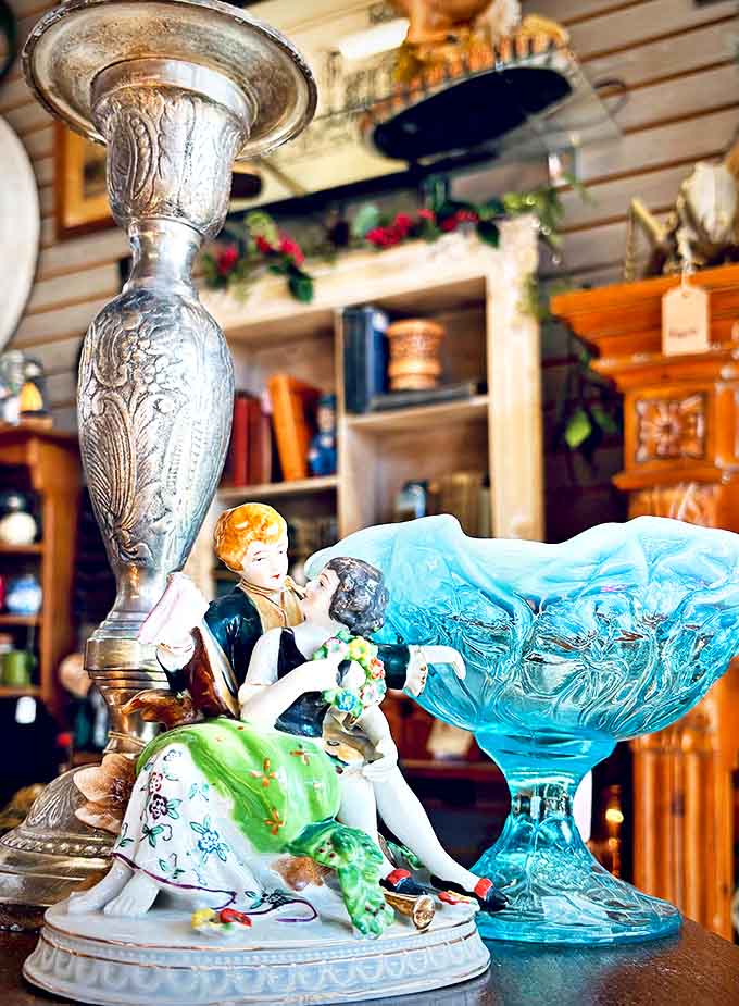 Delicate porcelain figures frozen in an eternal dance, their hand-painted details and romantic poses capturing the artistry of a bygone era.