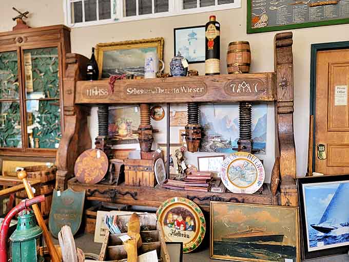 This wooden press once squeezed grapes or apples with artisanal precision, now it presses memories into the minds of visitors.