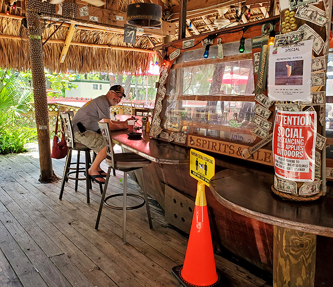 The bar area offers a front-row seat to Florida authenticity &ndash; where fishing tales grow taller with each round of drinks.