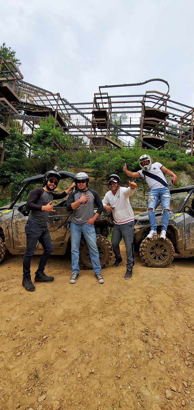The universal language of adventure: thumbs up and mud-splattered grins tell the story of trails conquered and memories made.