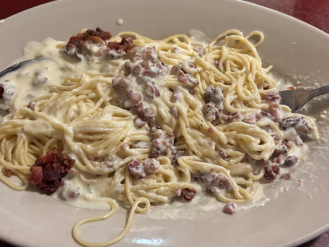 Carbonara that proves bacon and pasta were meant to be together, like an edible romance novel that always has a happy ending.
