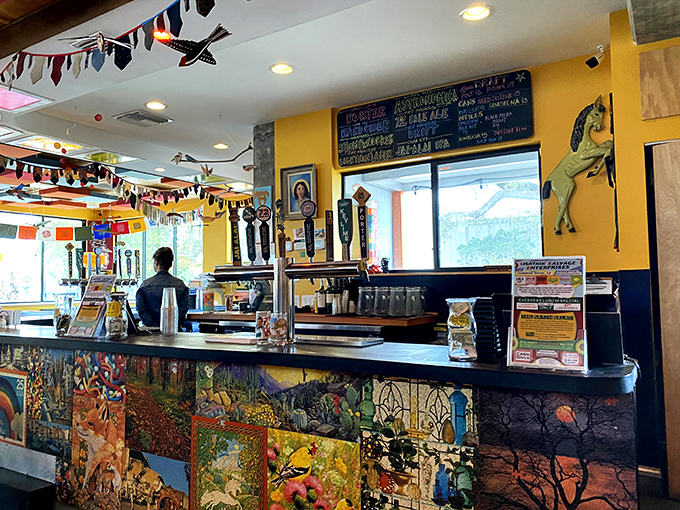 The counter area showcases the artistic spirit of Satchel's, with colorful mosaics and local artwork creating a feast for the eyes.