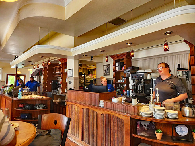 Where breakfast magic happens! The bustling counter showcases the choreographed dance of coffee brewing and plate preparation.