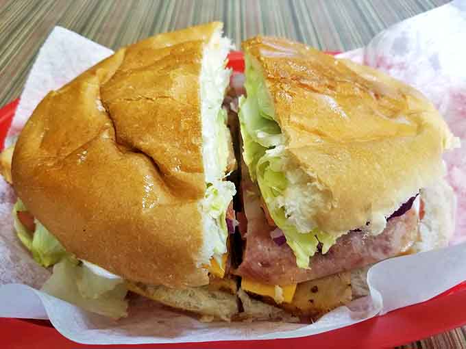 The row of cherry-red stools stands ready for the next wave of hungry patrons seeking breakfast nirvana.