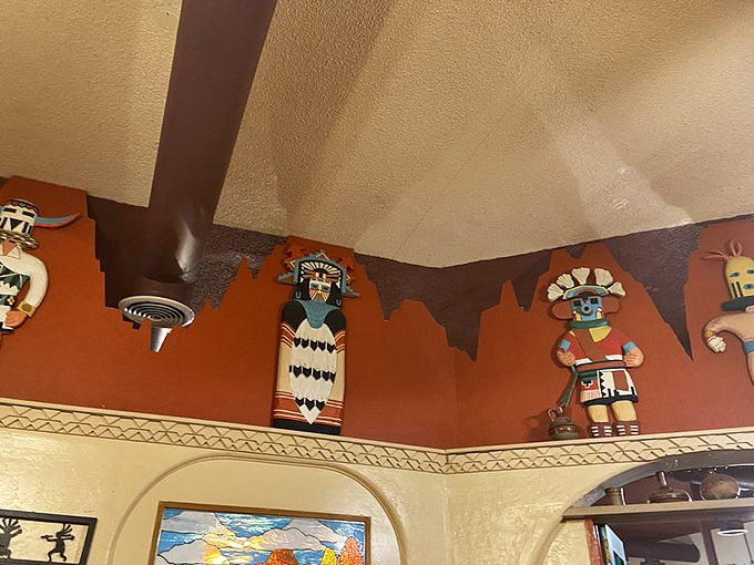 Native American-inspired artwork adorns the walls, creating a cultural backdrop that enhances the authentic Southwestern dining experience.