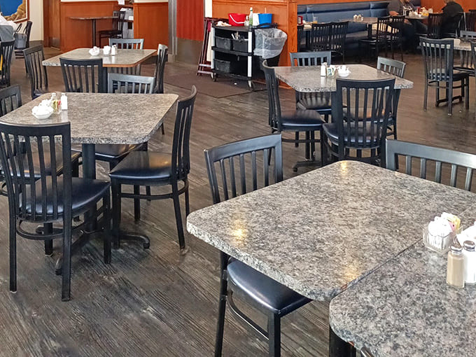 Clean, comfortable dining tables await &ndash; nothing fancy, just the perfect stage for the real stars: the food.