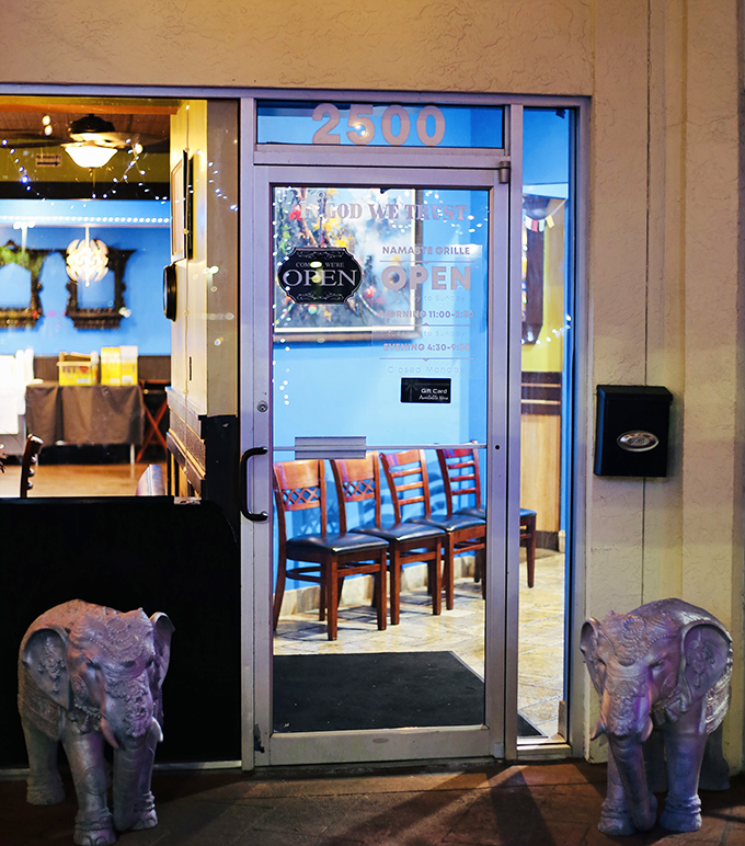 Elephant guardians flank the entrance &ndash; a whimsical welcome to this hidden gem that promises authentic South Asian flavors.