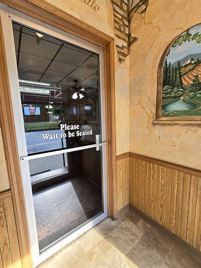 The entrance promises what every good restaurant should: a moment of anticipation before the feast begins.