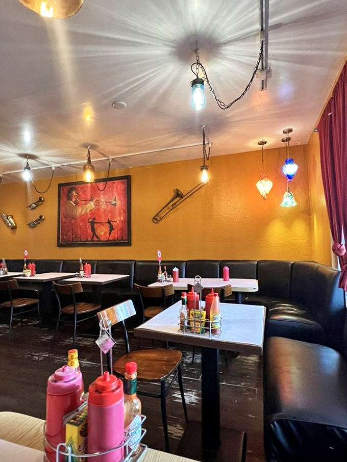 Colorful pendant lights cast a warm glow over the dining area, where jazz instruments on the walls remind you of the restaurant's musical namesake.