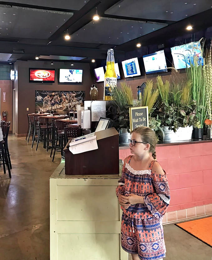 Retro charm meets roadside comfort with booths designed for lingering conversations and pizza-fueled revelations about life's journey.