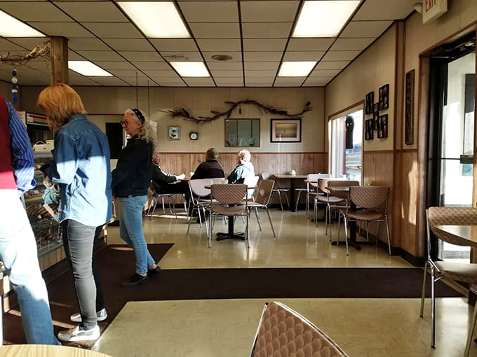 The no-frills dining area offers a glimpse into small-town Michigan life, where conversations flow as freely as the coffee.