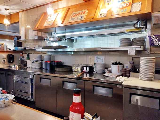 The kitchen &ndash; command central where the magic happens, gleaming stainless steel and organized chaos producing plate after plate of comfort.
