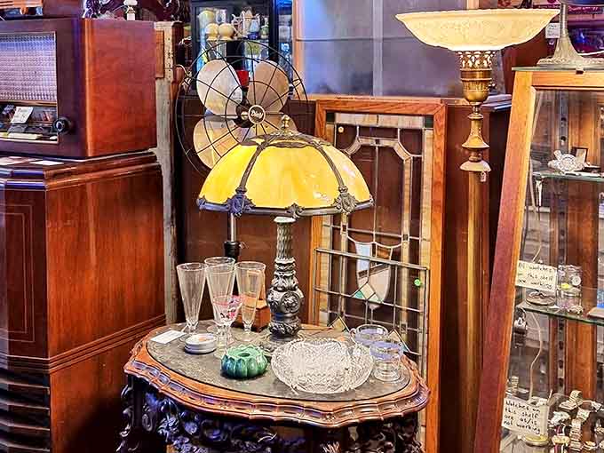 Vintage lamps cast warm glows throughout the space, proving that lighting fixtures used to be actual works of art.